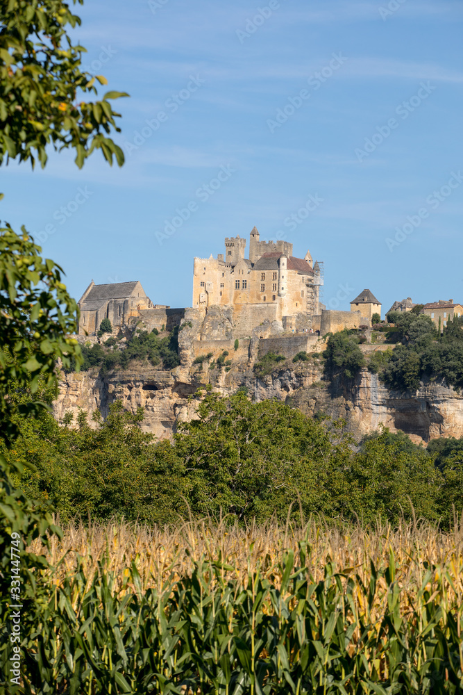 The medieval Chateau de Beynac rising on a limestone cliff above the ...