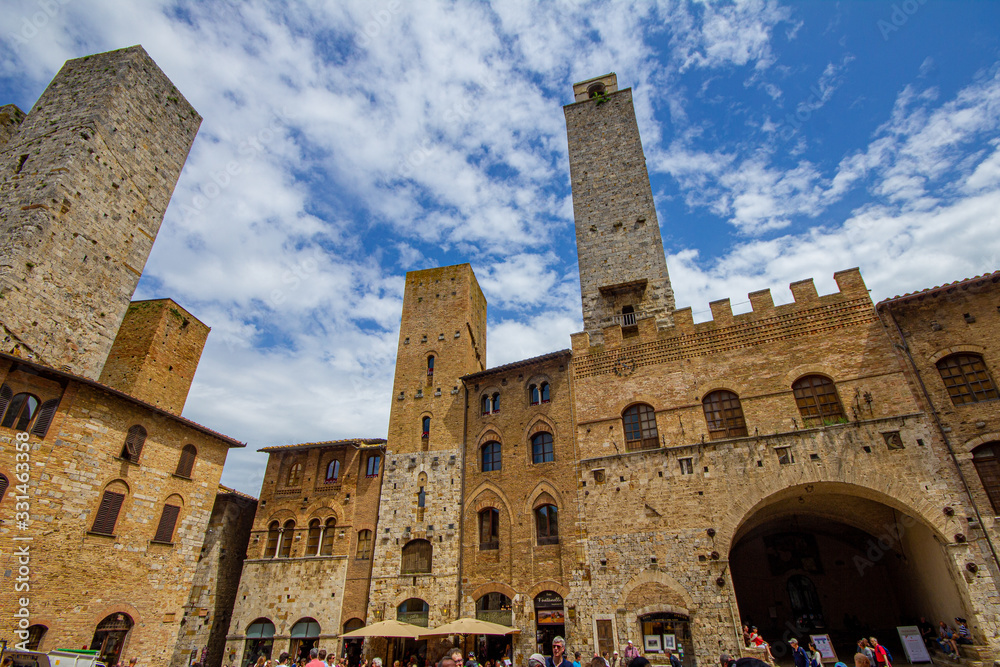The towers, the square and the medieval buildings in the ancient ...