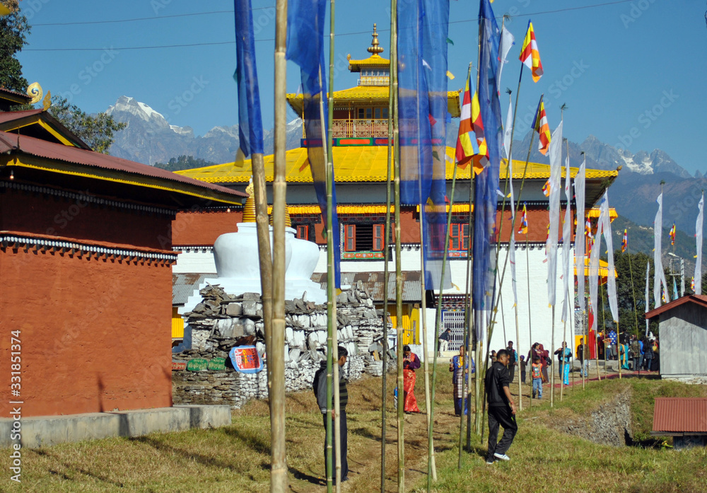 People gathered at Tashiding monastery which covers with colorful ...