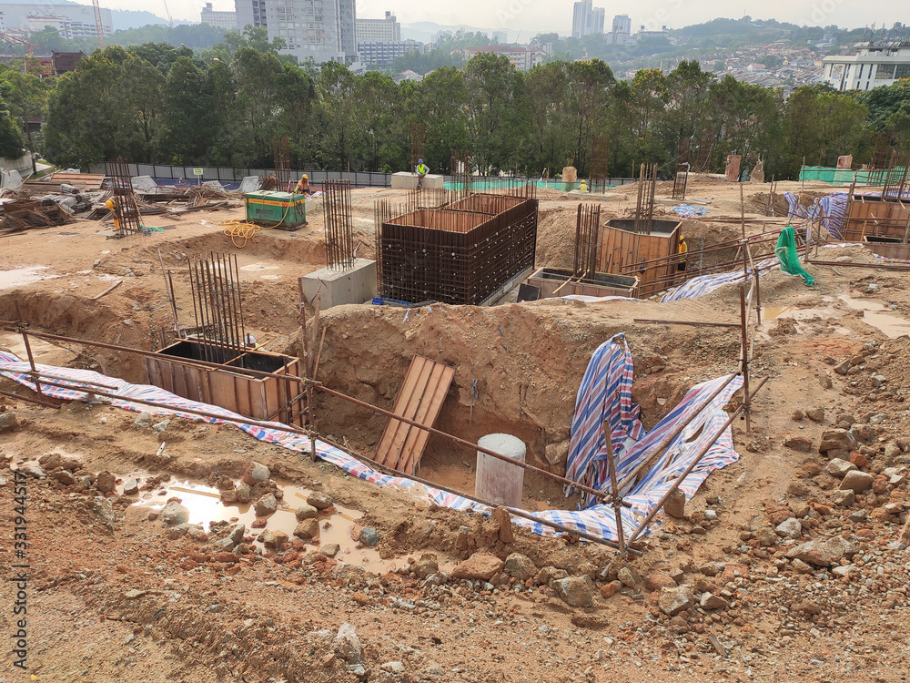 Pile cap and column stump under construction at the construction site ...