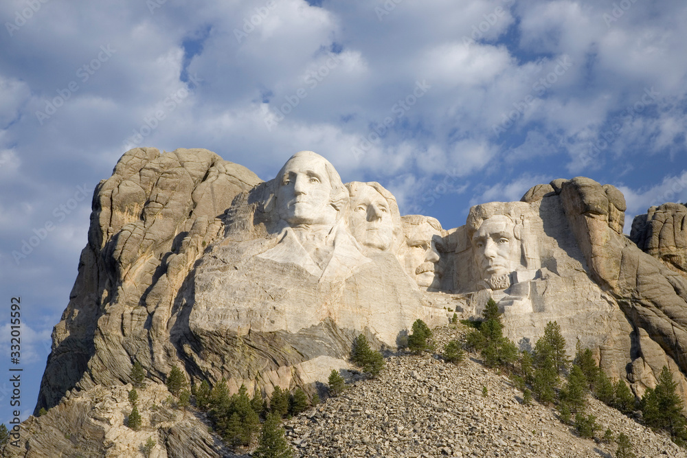 White puffy clouds behind Presidents George Washington, Thomas ...