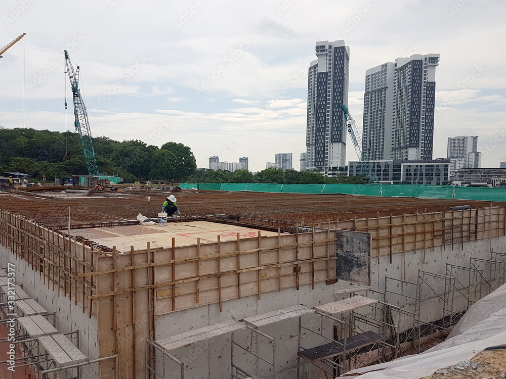 Building floor slab under construction. Construction workers ...