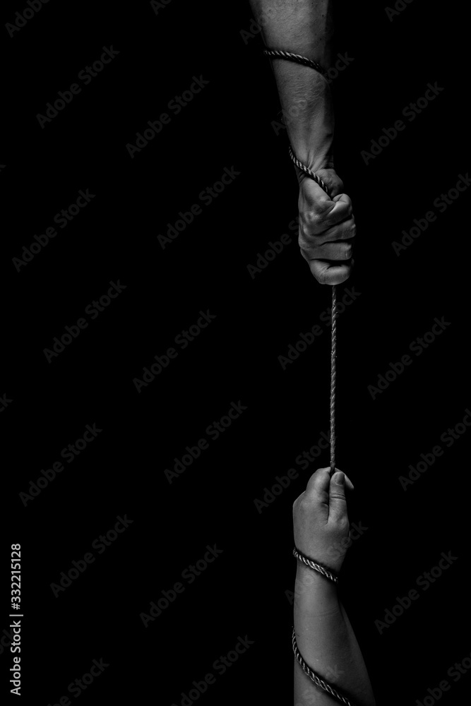 Helping Hand, Hand reaching, trying to pull up with rope and rescue ...