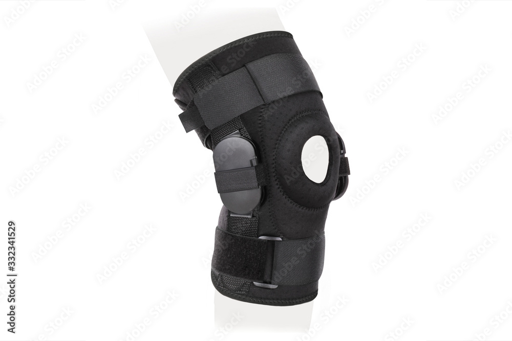 Knee Support Brace on leg isolated on white background. Orthopedic ...