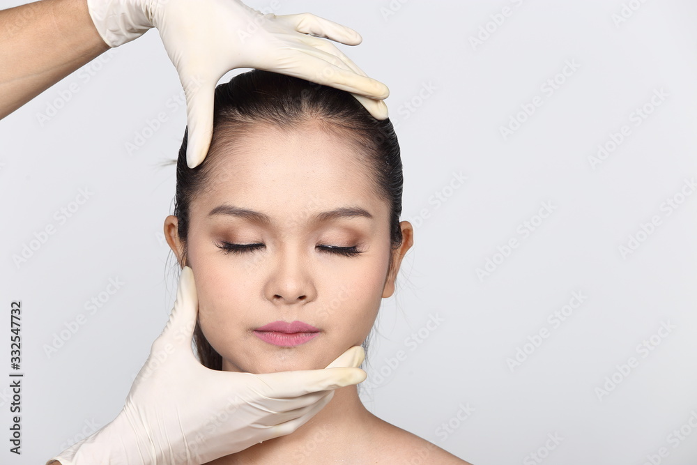 Asian Beautiful Woman diagnose face skin structure and prepare to ...