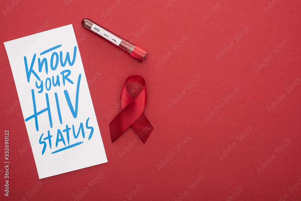 top view of card with know your HIV status lettering and awareness ...