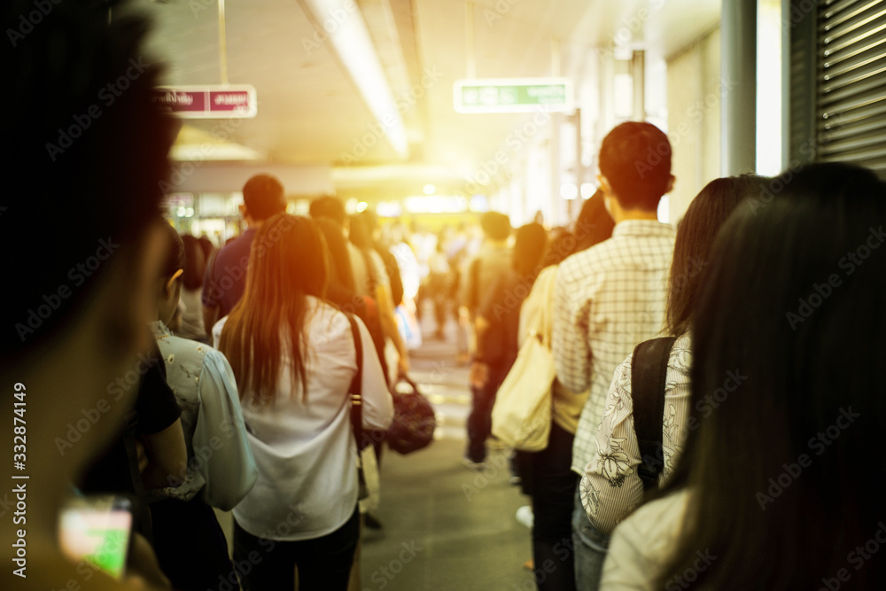 Back portrait crowd of people waiting for the train at the platform of ...