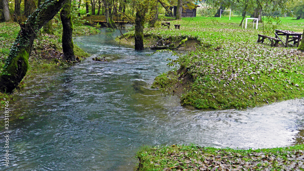 Stock-Foto „Spring cave and creek Baracevac or Izvor spilja i potok ...