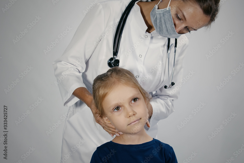 Female doctor examining touching neck check throat lymph gland tonsils ...
