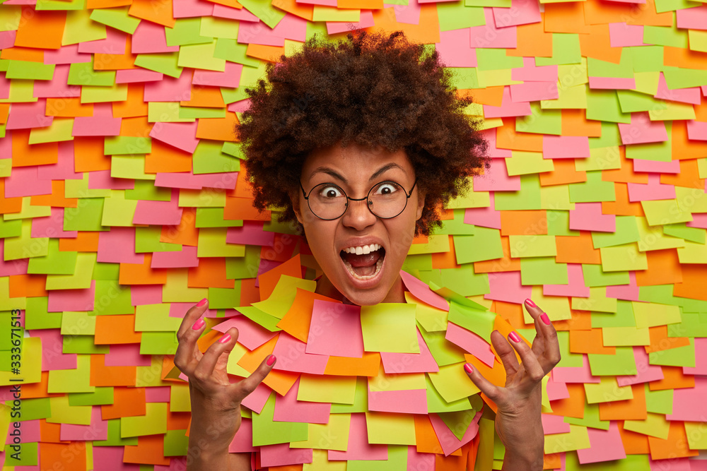 Pissed off annoyed woman makes irritated grimace, yells angrily and ...