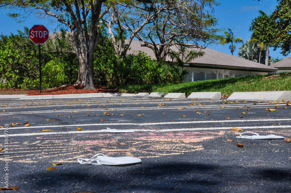 coronavirus mask n95 stop sign white red trees dual laying closeup stop ...