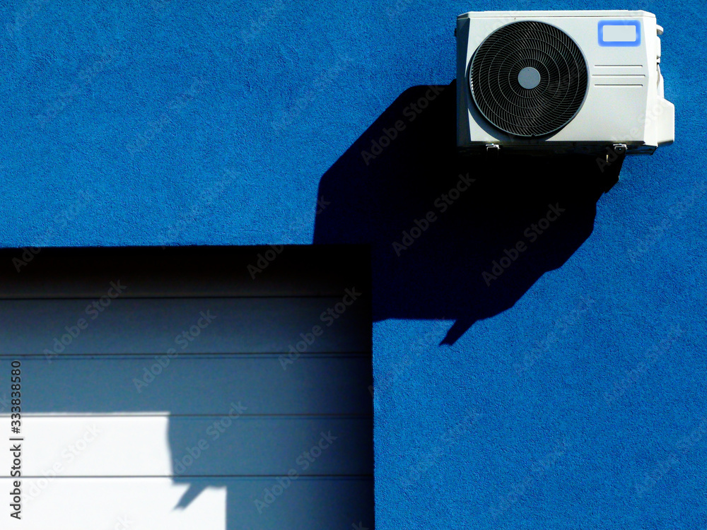 blue textured stucco exterior elevation detail and with wall installed ...
