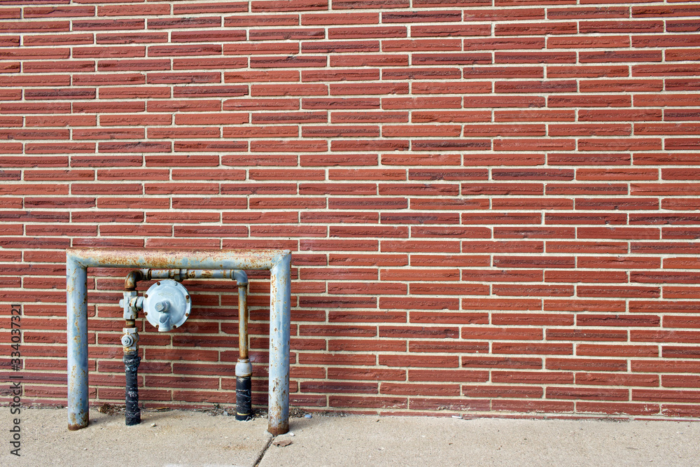 Vintage red color brick wall background with textured striped bricks in ...