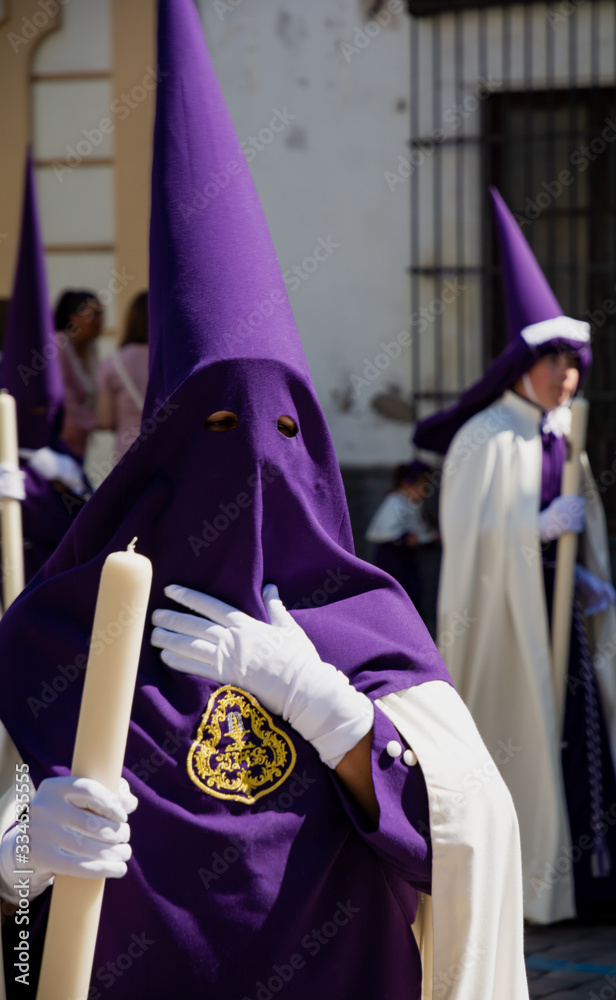 Stock-Foto „Semana Santa (Holy Week). Penitent (Nazarene) in violet ...