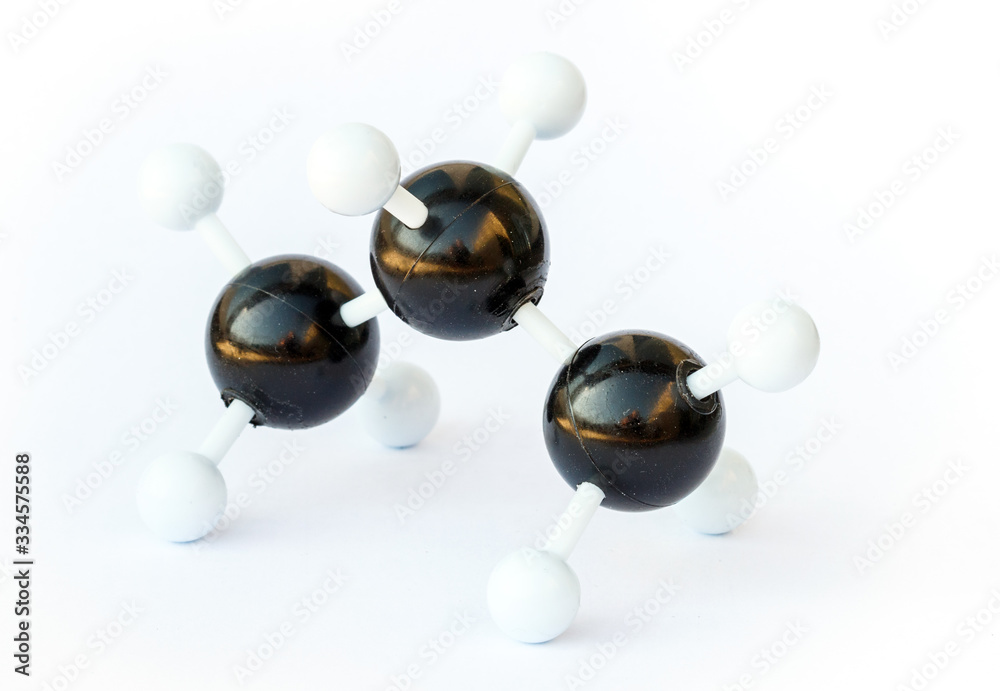 Plastic ball-and-stick model of a propane (chemical formula C3H8 ...