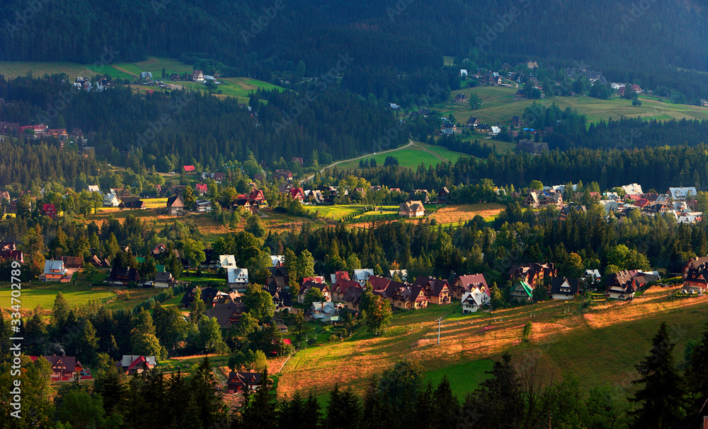 Panoramic view of a Zakopane mountain resort outskirts under the ...