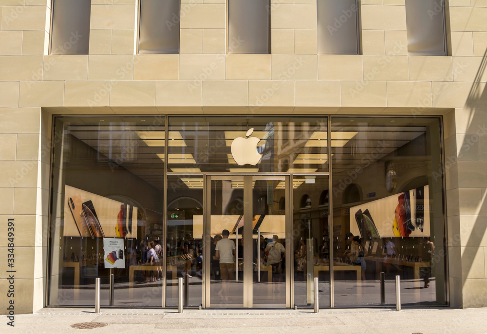 Basel, SWITZERLAND - July 1, 2019: APPLE store and logo. Apple Inc. is ...