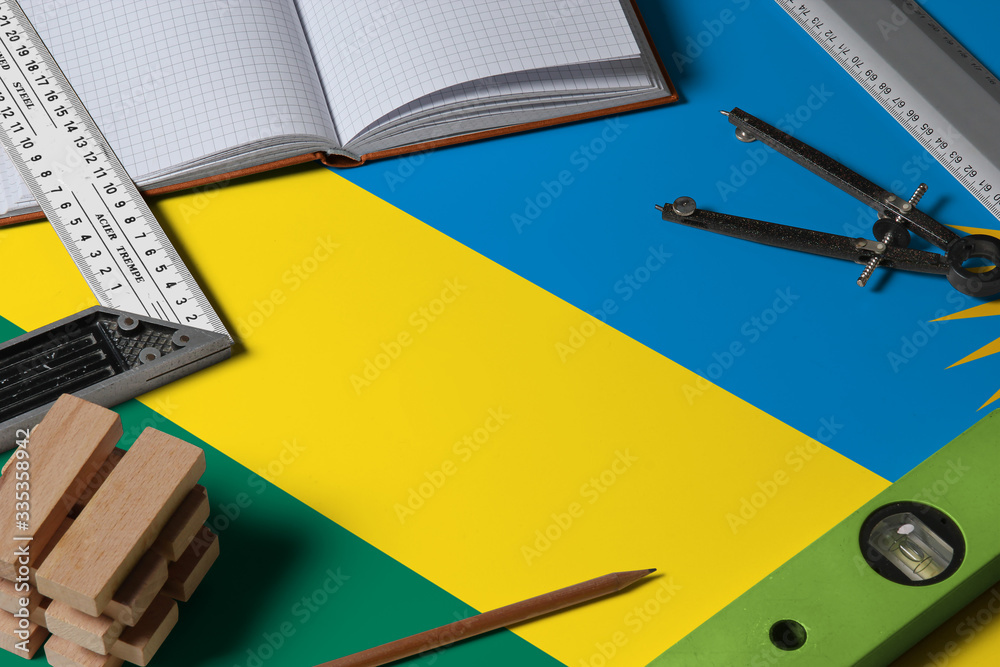 Rwanda national flag on profession concept with architect desk and ...