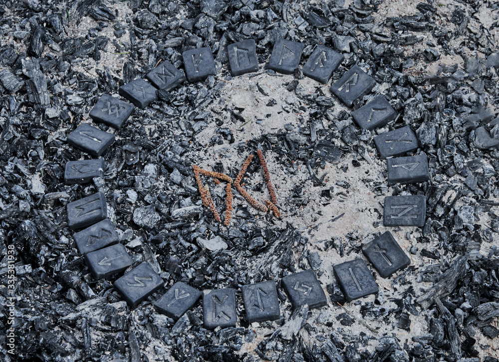 Photo Stock Norse rune Dagaz on ashes backgorund inside the circle of ...