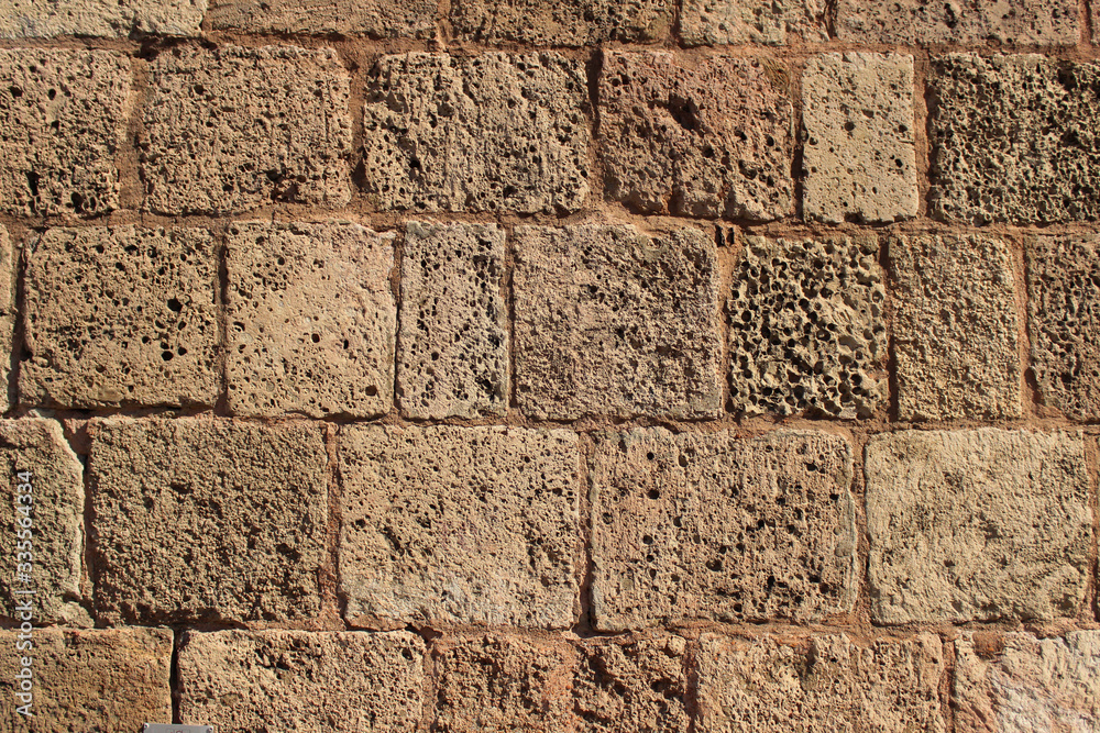 Sandstone wall texture. Limestone bricks that create building facade. Stock Photo | Adobe Stock