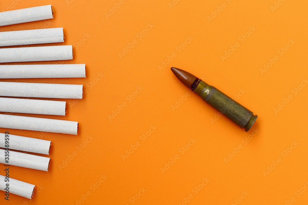 Cigarettes and bullet, metaphor for killing the body with nicotine ...