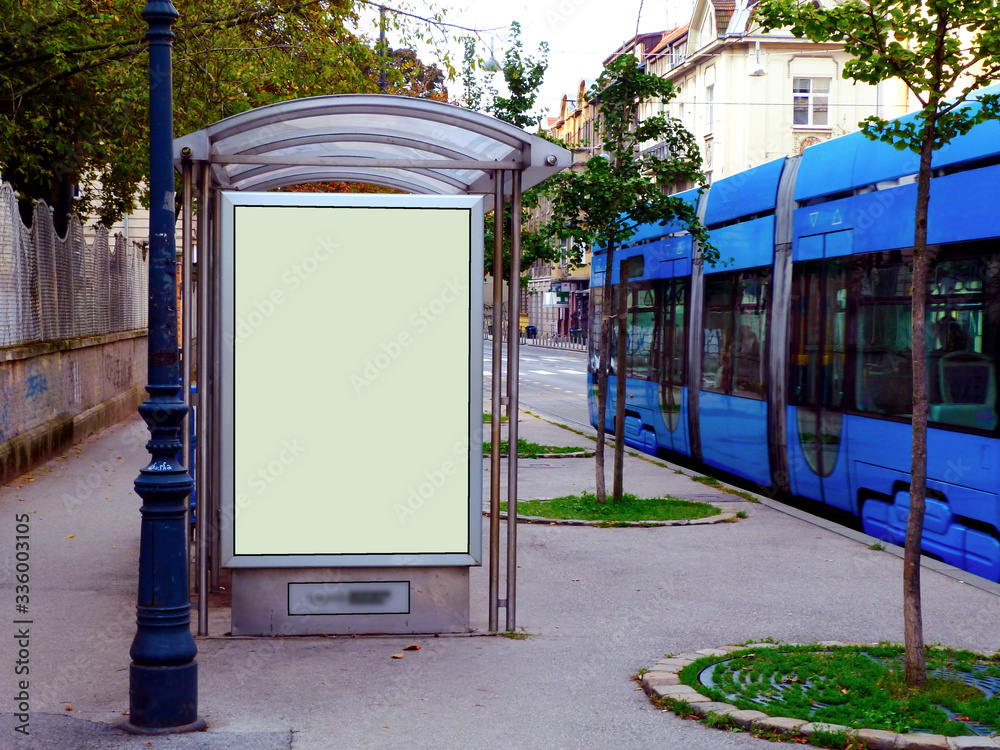 bus shelter at tram stop. bus shelter and busstop. blank billboard ad ...