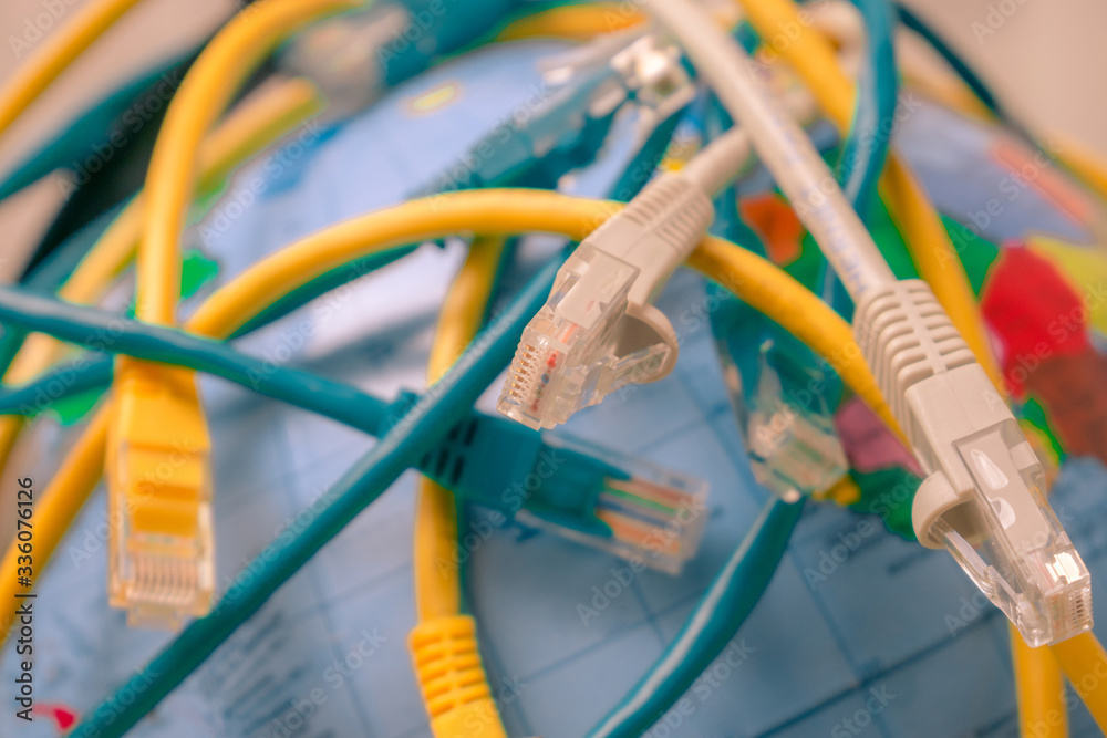 Terminal end is a close-up. A lot of tangled internet wires entangle ...