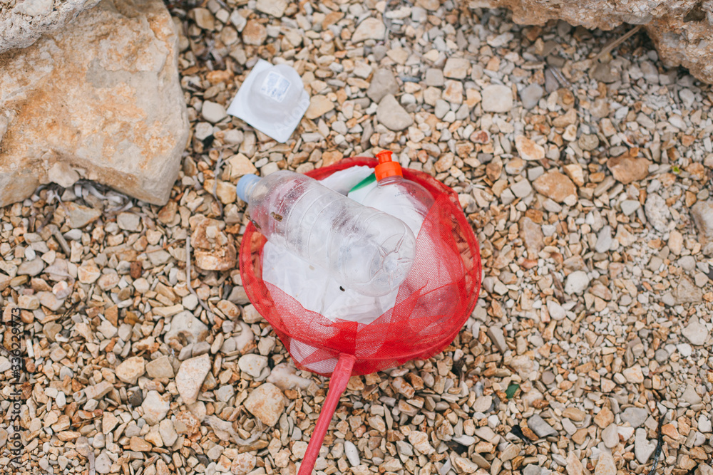Plastic in a fishing net Stock Photo | Adobe Stock