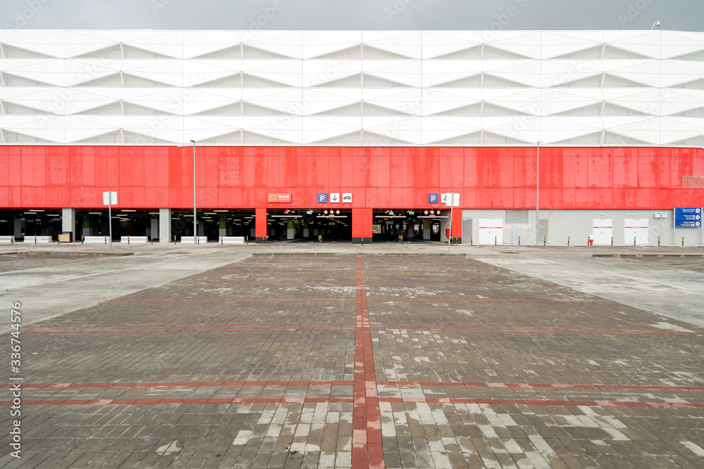 Empty parking lot in front of the biggest shopping mall in Algarve ...