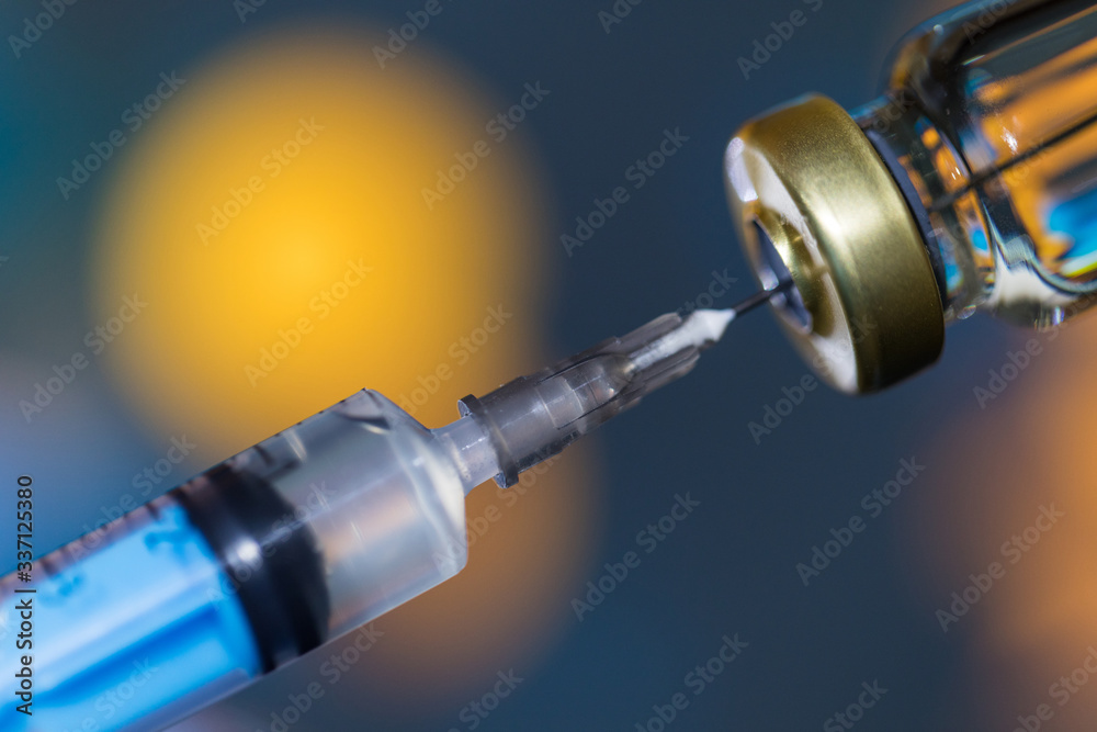 Close up vaccine vial dose flu shot drug needle syringe, medical ...