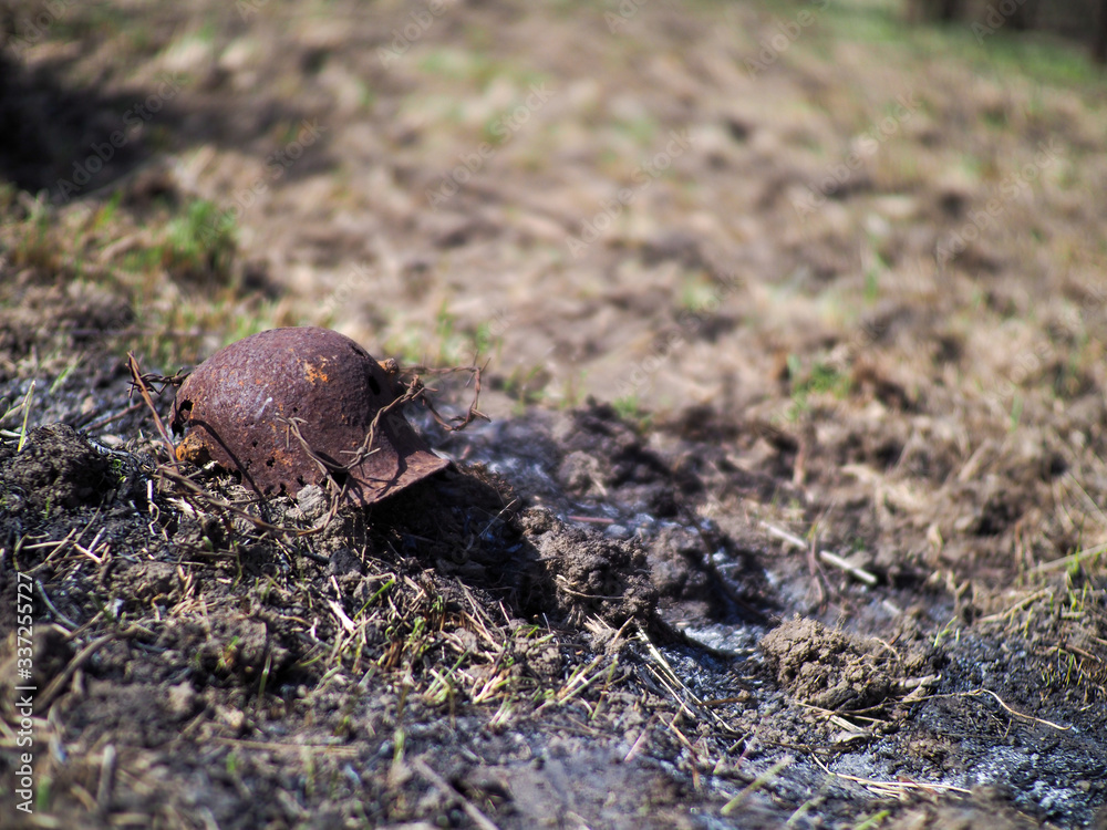 Foto de Stock Wehrmacht Rusty M35 Helmet WWII Damaged By Bullets And ...