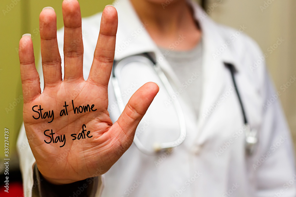Stay at home" "Stay safe in doctor's hand Stock Photo | Adobe Stock