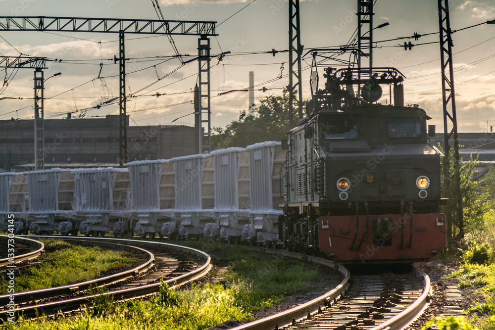 Daytime view of the railway freight train from the iron and steel works ...
