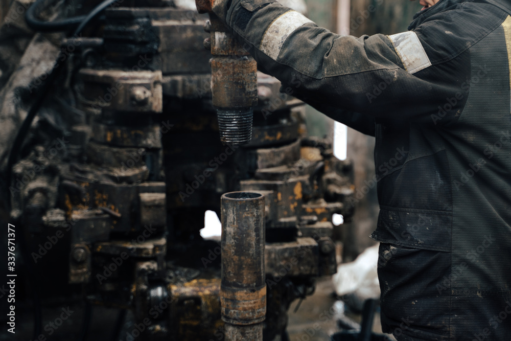 Offshore oil rig worker prepare tool and equipment for perforation oil ...