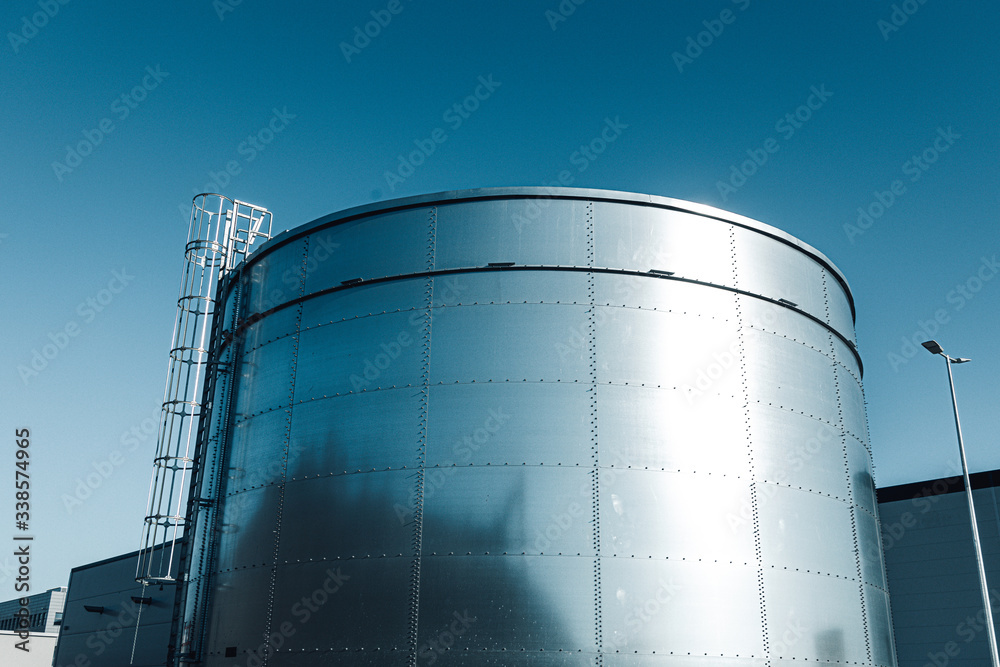 Metal industrial tank for water or fuel Stock Photo | Adobe Stock