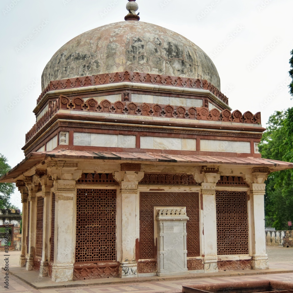 Photo Stock Inside the Qutub Minar Complex with antic ruins and inner ...