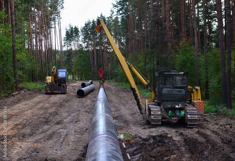 Natural gas pipeline construction work. A dug trench in the ground for ...