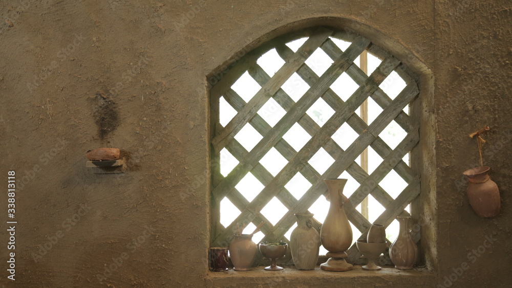 The interior of the Jewish room in Bible. Various pottery: jugs, pots ...