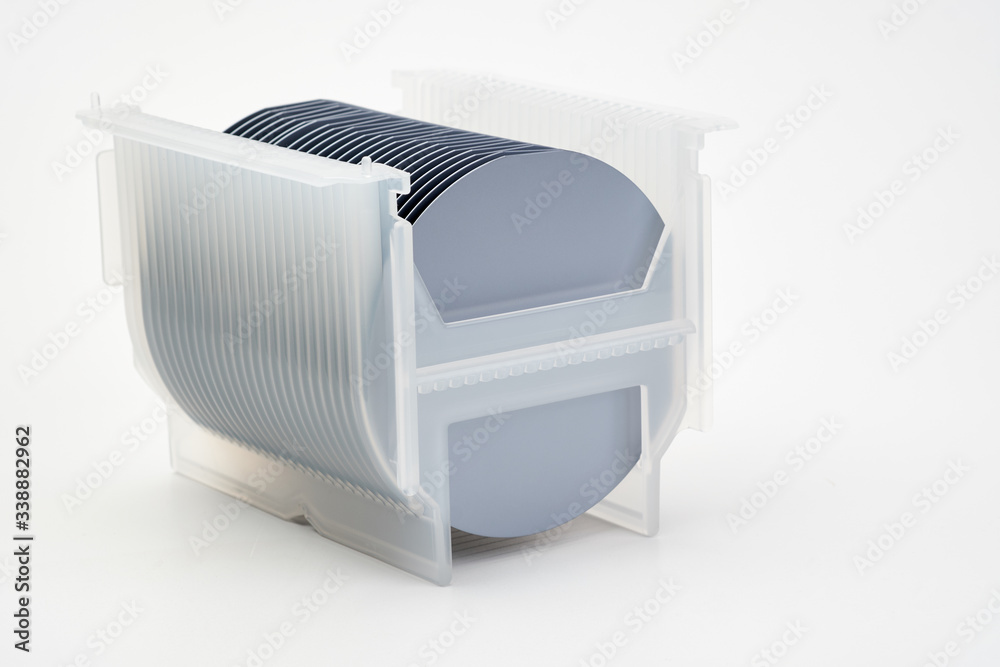 Silicon wafers in plastic container Stock Photo | Adobe Stock