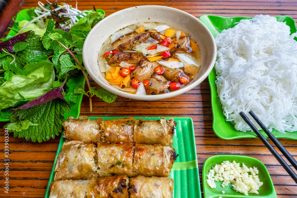 Barbecue cooking on fire - the ingredient of "bun cha", the famous Vietnamese vermicelli with ...