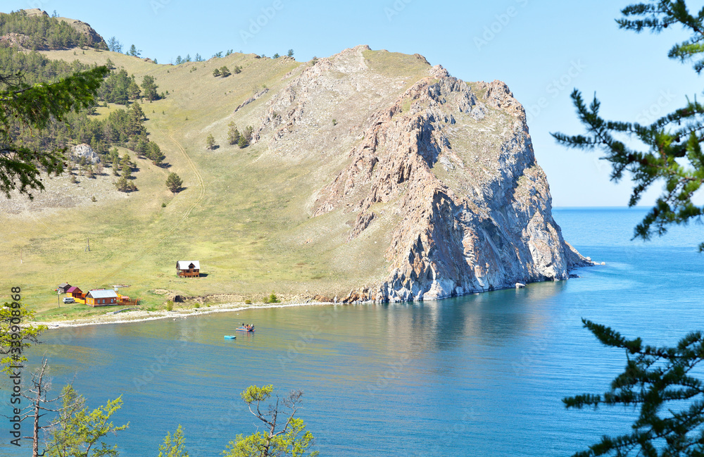 Lake Baikal on sunny summer day. Top view of the Haga-Yaman Bay, wooden ...