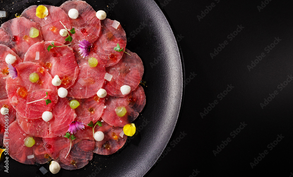 Sashimi with thymes and tidbits flavors on top. Presentable sashimi ...