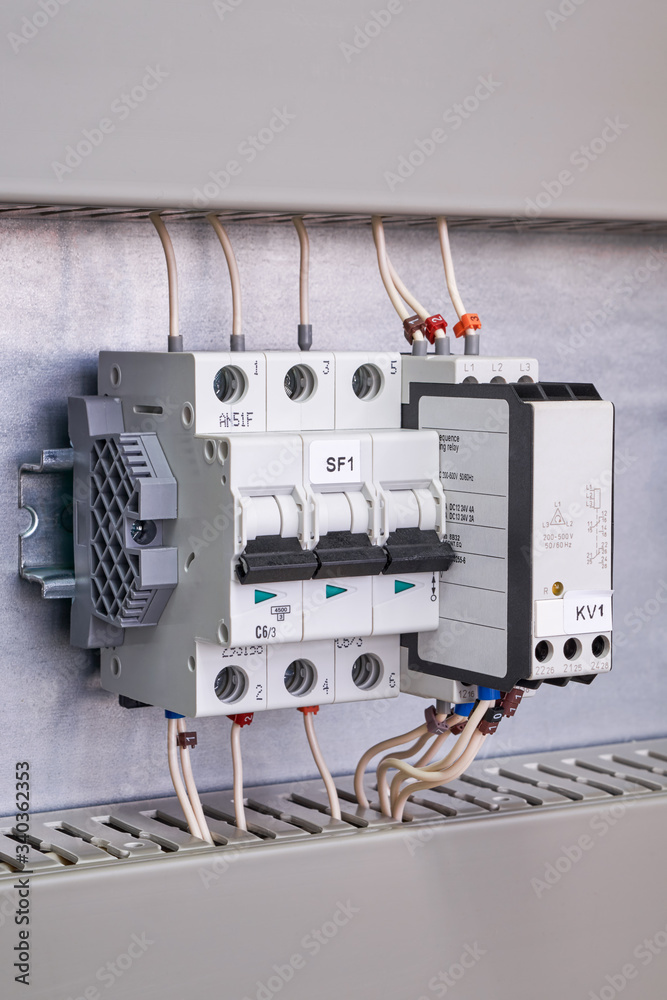 Modular circuit breaker, phase control relay and a stop that locks them ...