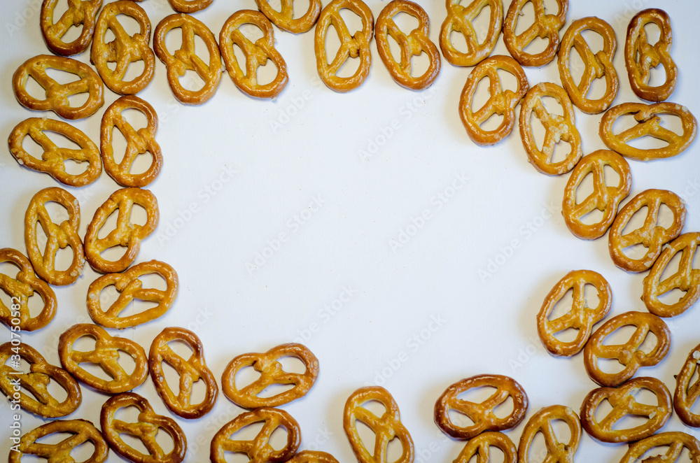 Organic Brown Mini Pretzels with Salt on white background with place ...
