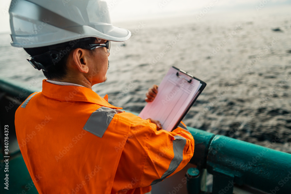 Filipino deck Officer on deck of offshore vessel or ship , wearing PPE ...