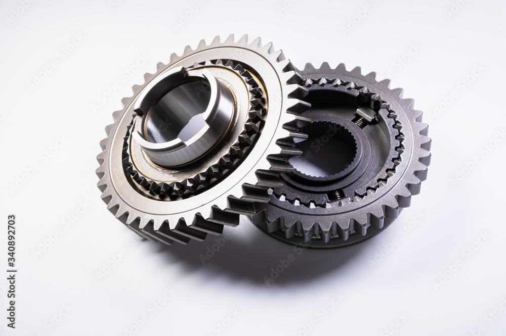 New parts on a gray background. Gears of gear shifting torque ...