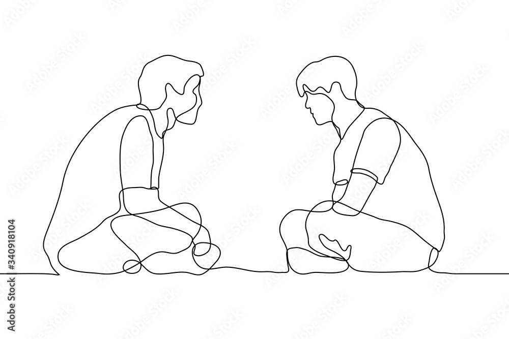 Two men are sitting opposite each other in Turkish (pose Sukhasana ...