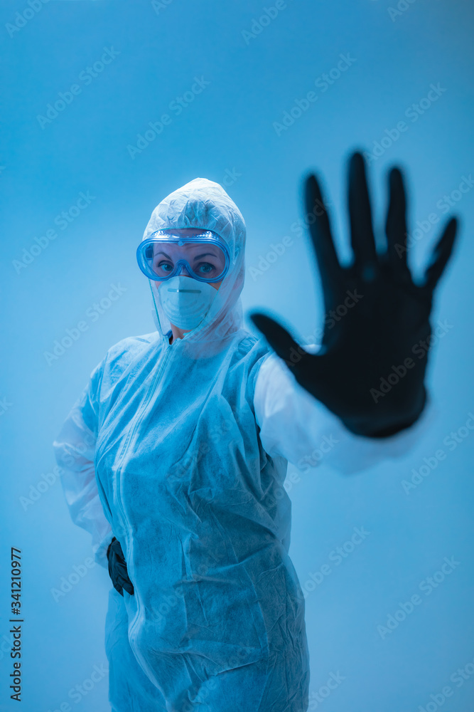 Medical doctor, scientist in full body suit for prevention from viruses ...