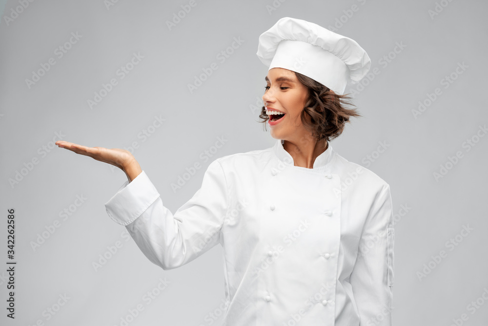 cooking, advertisement and people concept - happy smiling female chef ...