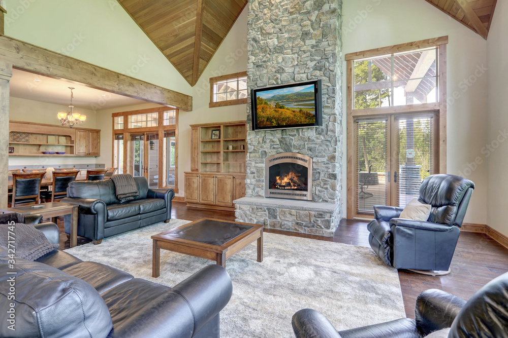 Very large rustic classic American home living room interior with ...